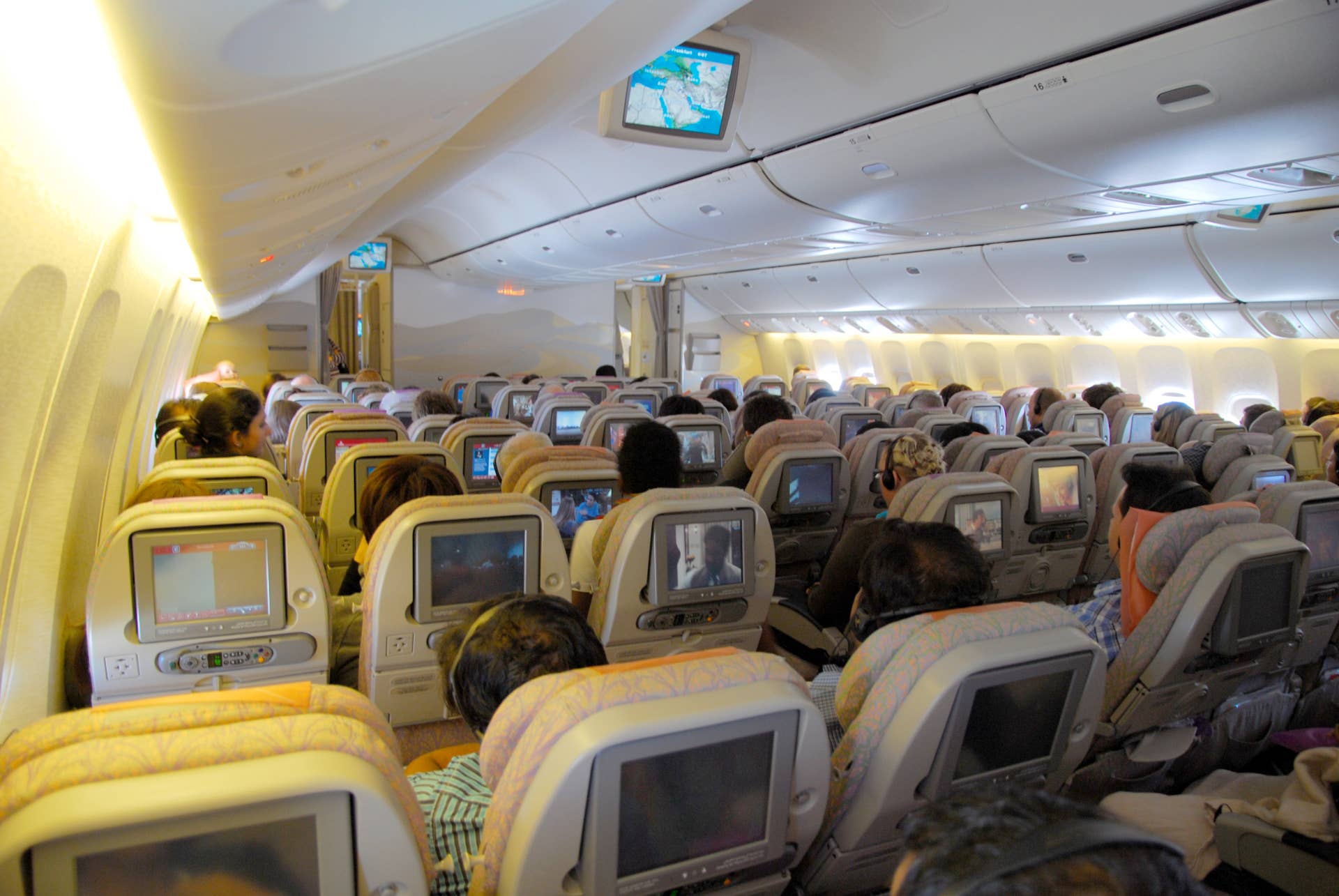 How to Fly Comfortably in Economy on Long-Distance International ...